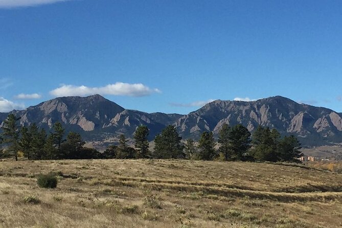 "Boulder Peaks & Wilderness Tours: Mallory Cave Trail" - Traversing Pine Forests and Meadowlands