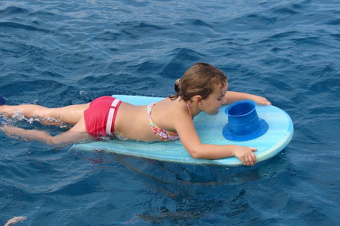 Deluxe Snorkel & Dolphin Watch Aboard a Luxury Catamaran from Kailua-Kona - The Sum Up