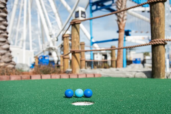 Mini Golf beneath SkyWheel Panama City Beach - Key Points
