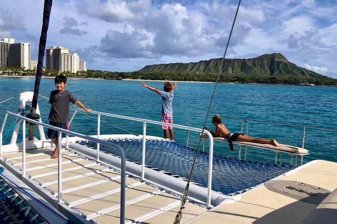 Moanas SwimnSail Cocktail Cruise Along the Waikiki Coast - Swimming and Relaxation