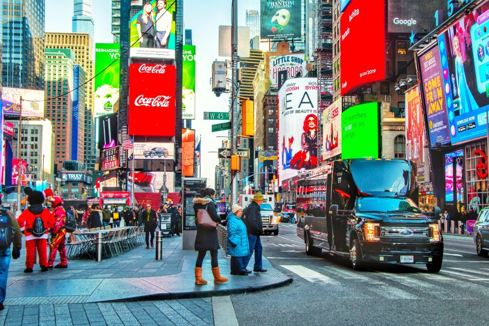 NYC: Guided Bus and Walking Tour with Staten Island Ferry - Key Points
