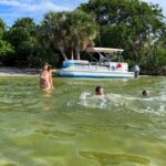 Swimming in a Dolphin and Manatee Lagoon Boat Tour - Frequently Asked Questions
